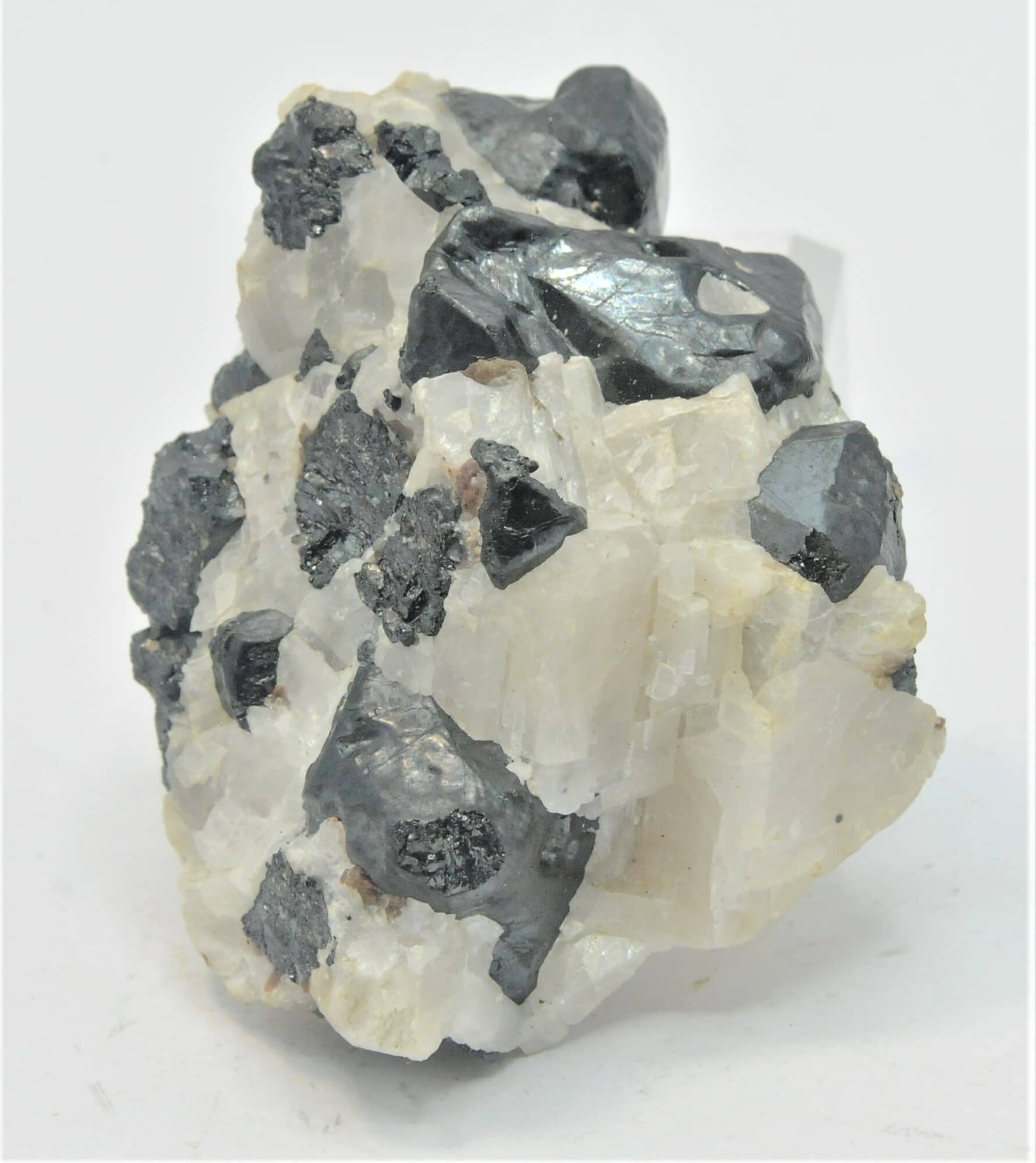 Franklinite on Calcite, Franklin and Sterling Hill, New Jersey, USA.